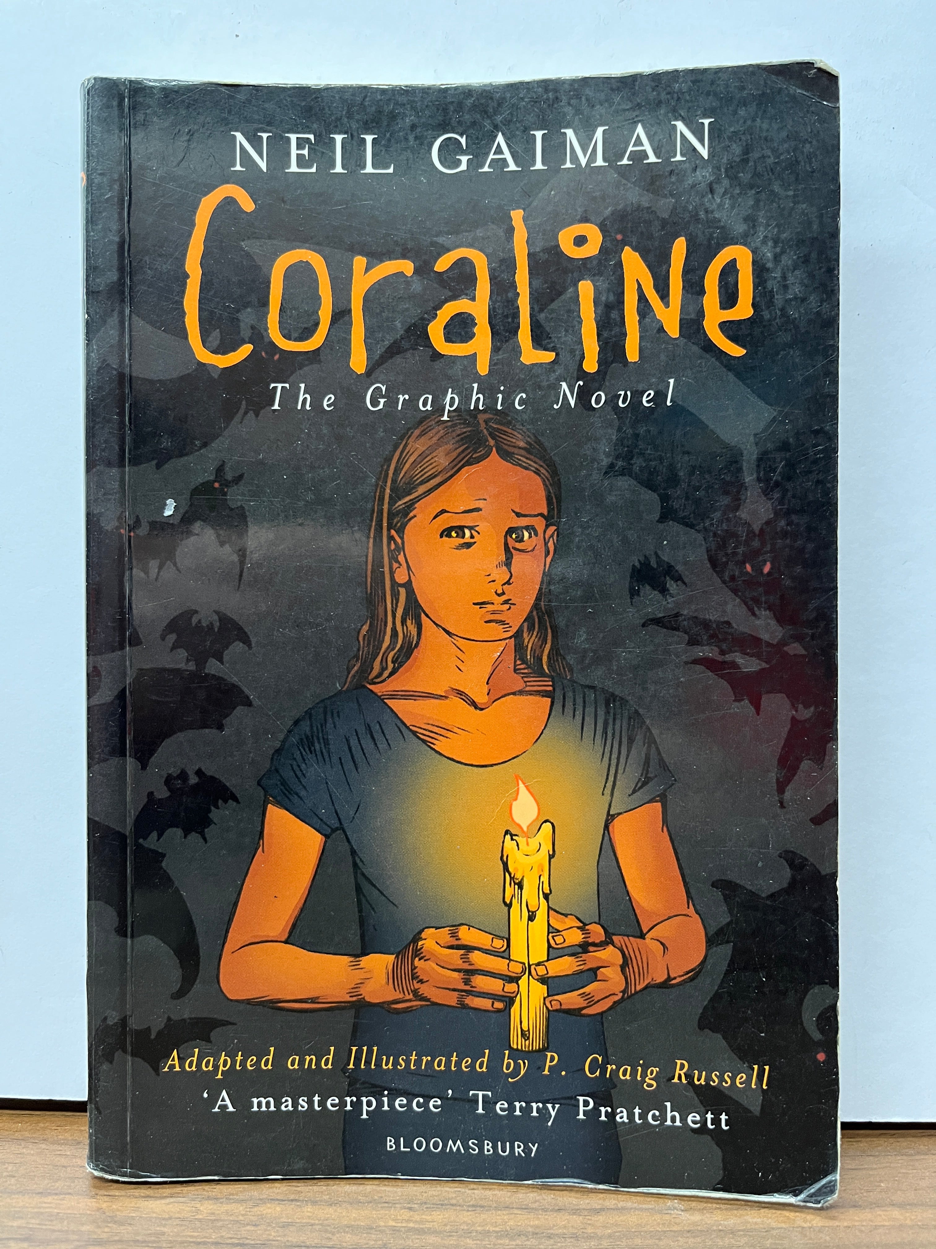 Coraline: The Graphic Novel by Neil Gaiman - T's Textbooks